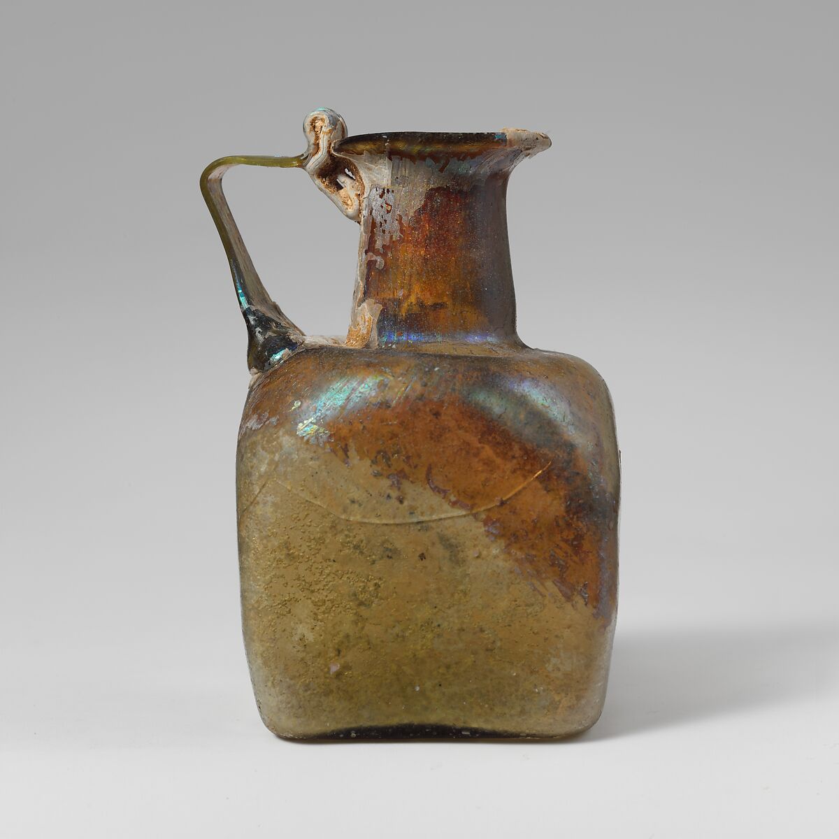 Glass square bottle | Roman | Mid Imperial | The Metropolitan Museum of Art