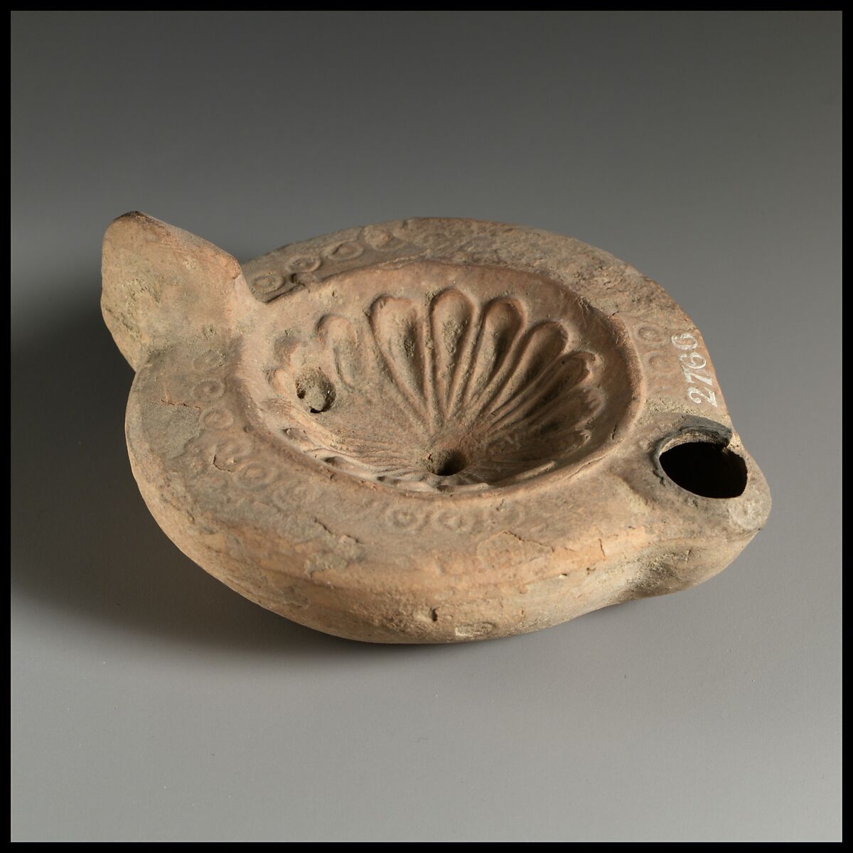 Terracotta oil lamp | Roman | Mid Imperial | The Metropolitan Museum of Art