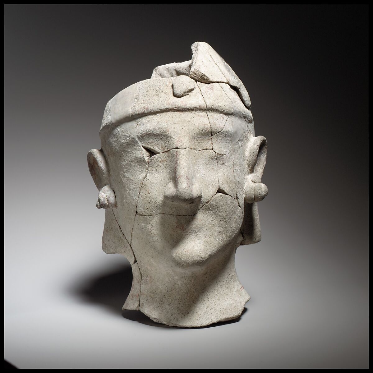 Beardless male head wearing a helmet - Cypriot - Cypro-Archaic II - The ...