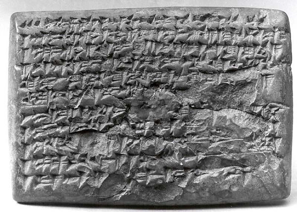 Cuneiform tablet impressed with two stamp seals: promissory note for ...