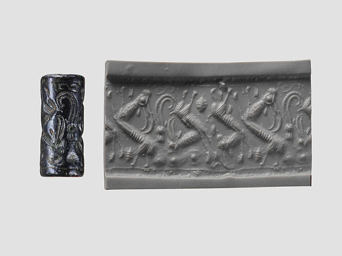 Cylinder seal and modern impression: Master of Animals between lions ...