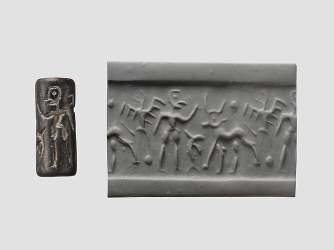 Cylinder seal and modern impression: Master of Animals between lions ...