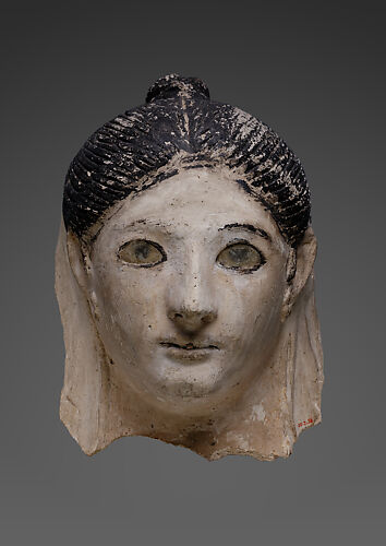 Mask of a woman with a large coil of plaited hair | Roman Period ...