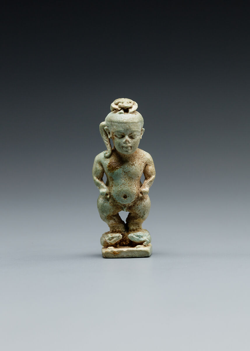 Amulet: Pataikos astride crocodiles and with a scarab on his head ...