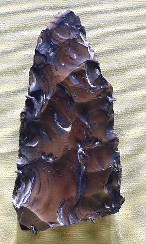 Biface, commonly referred to as a hand ax | Lower Paleolithic Period ...