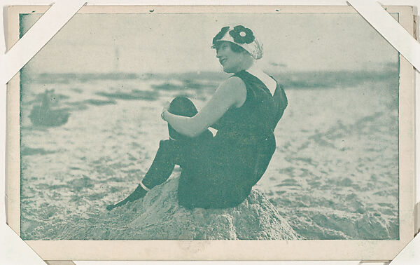 Bathing beauty seated in water from Actress series (W423) - The ...